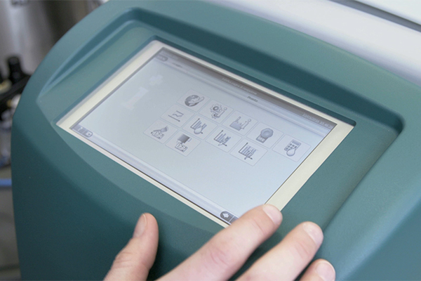 Flexible wrap-around labeling with hot melt adhesive | Robatech